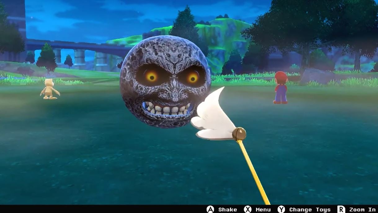 Someone modded the Majora's Mask Moon into Pokemon Sword and Shield ...